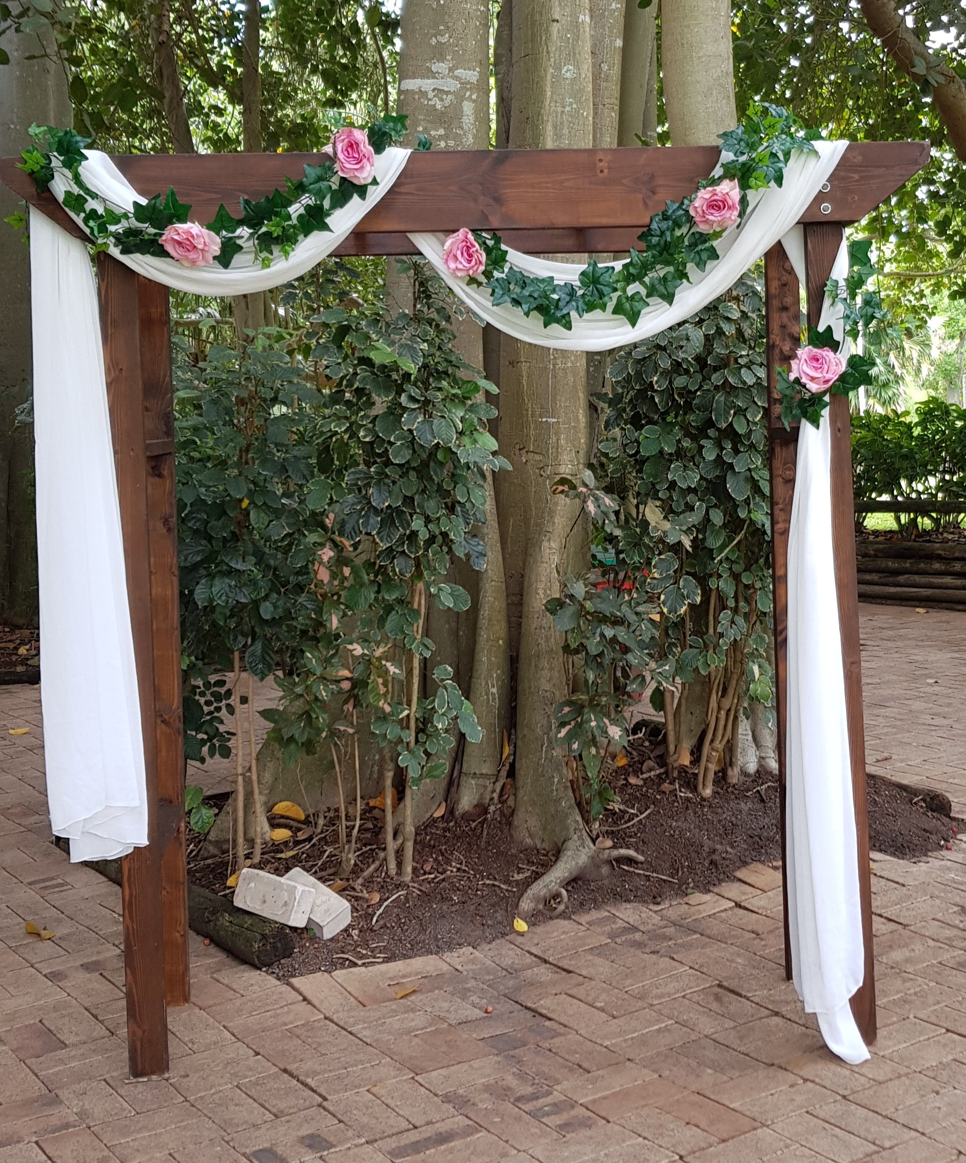 Dark Timber Arch – Ace Wedding and Party Hire